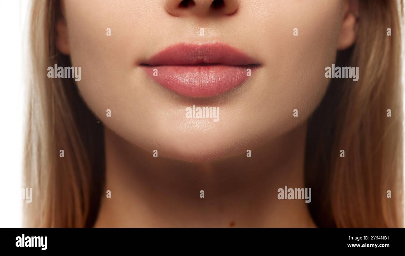 Cropped image of female face, jaw, plump lips and perfect chin. Lip ...