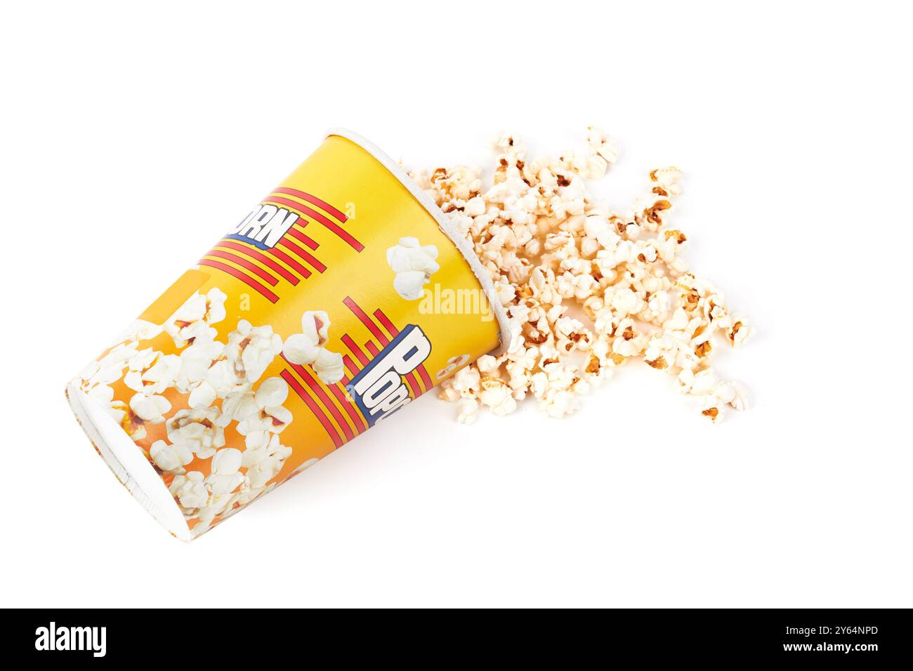 Scattered popcorn from yellow bucket isolated on white background Stock ...