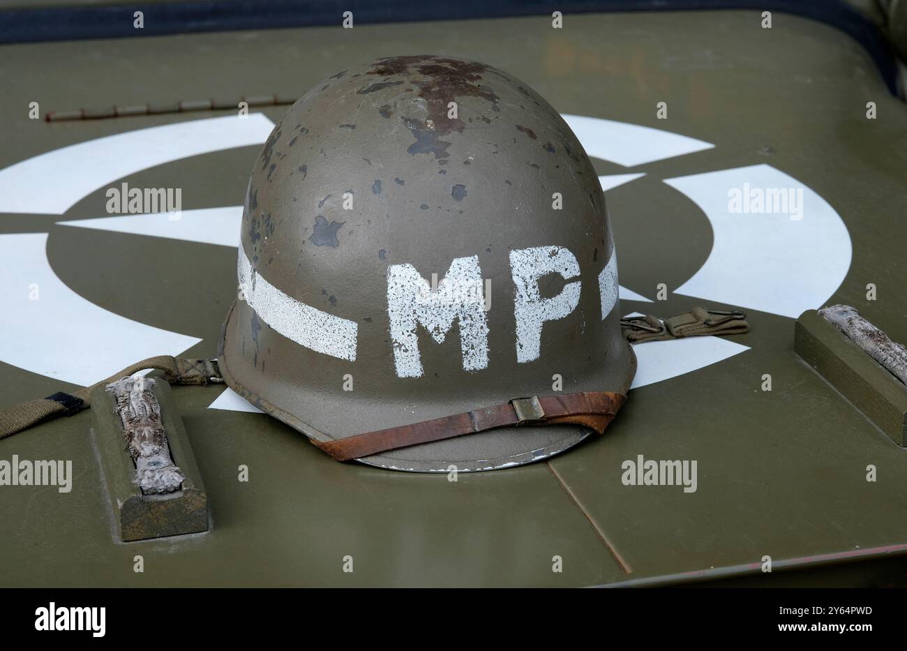 military police helmet on hood of military jeep Stock Photo - Alamy