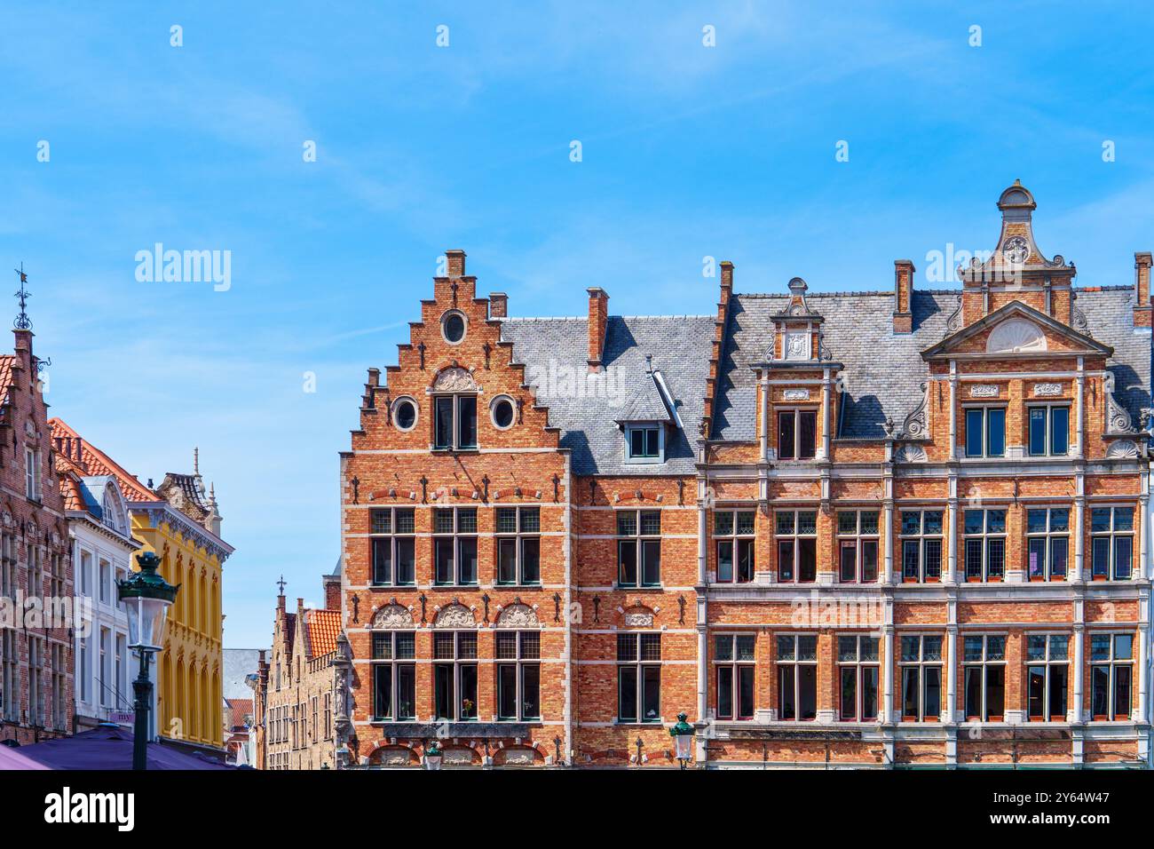 Charming and colorful old buildings with brick facades in the city ...
