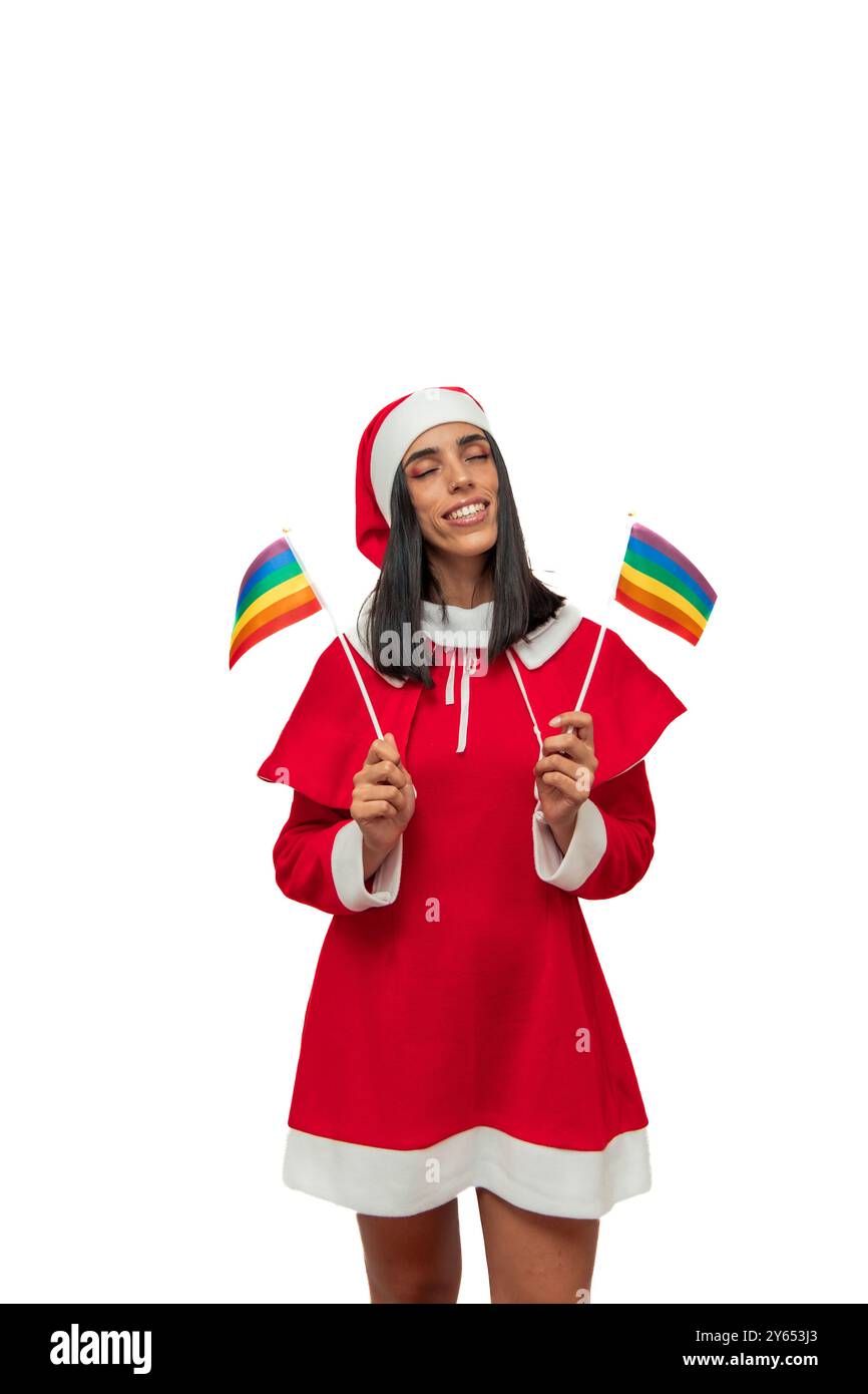 vertical young woman dressed in a Santa Claus outfit is holding two ...