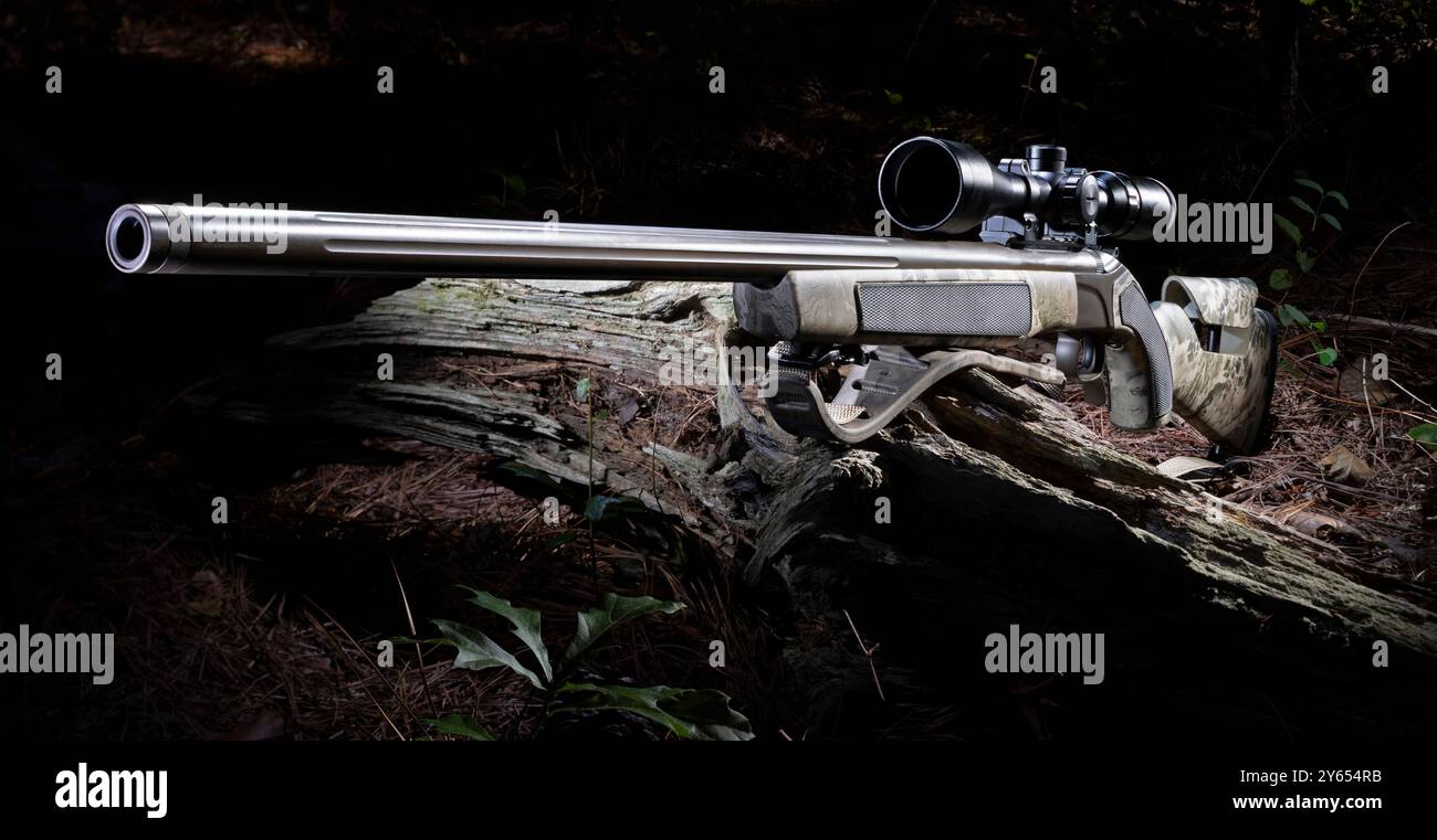 Modern inline muzze loading rifle with riflescope and fluted barrel ...