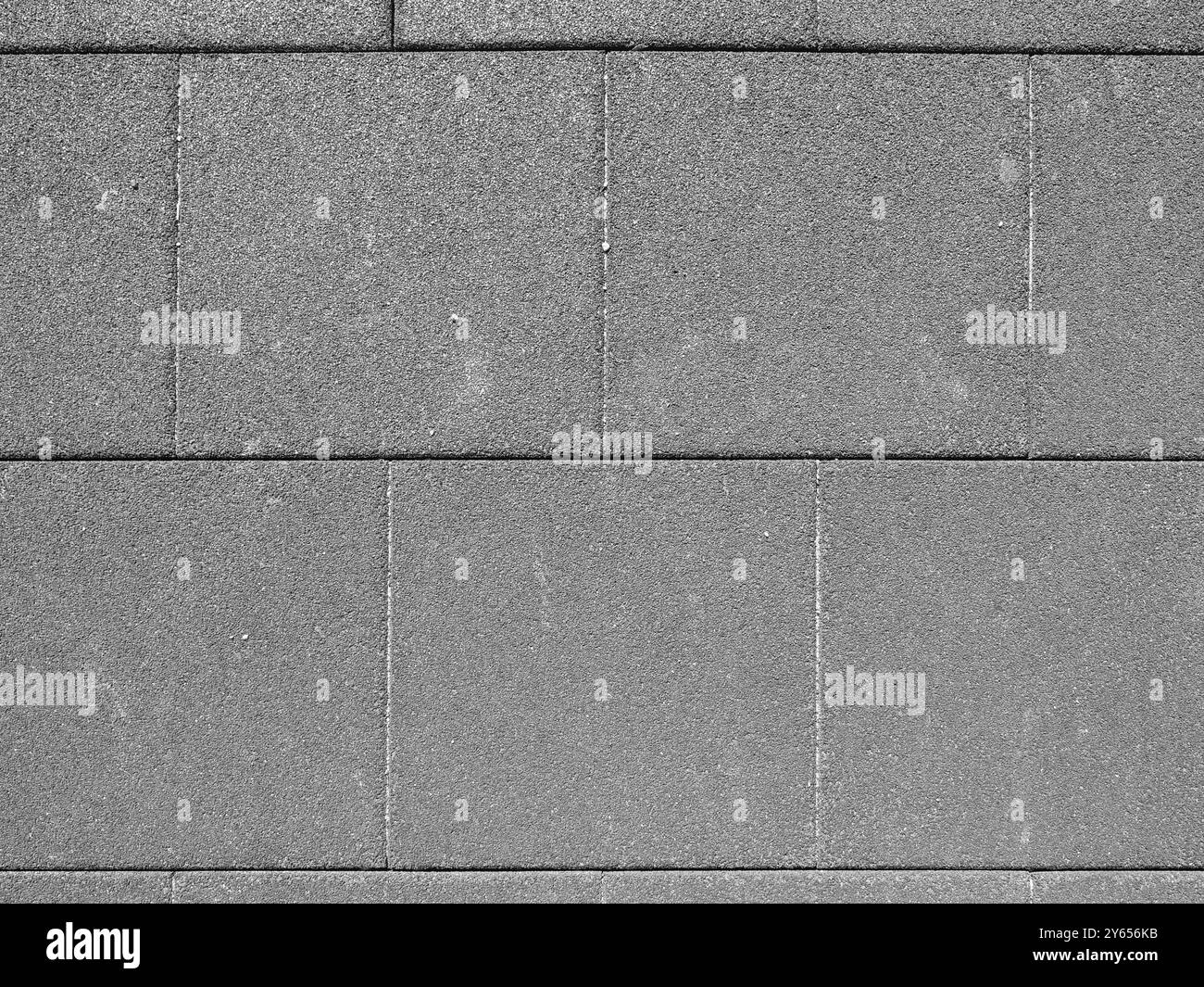 a tartan surface as fall protection under a climbing structure at a ...