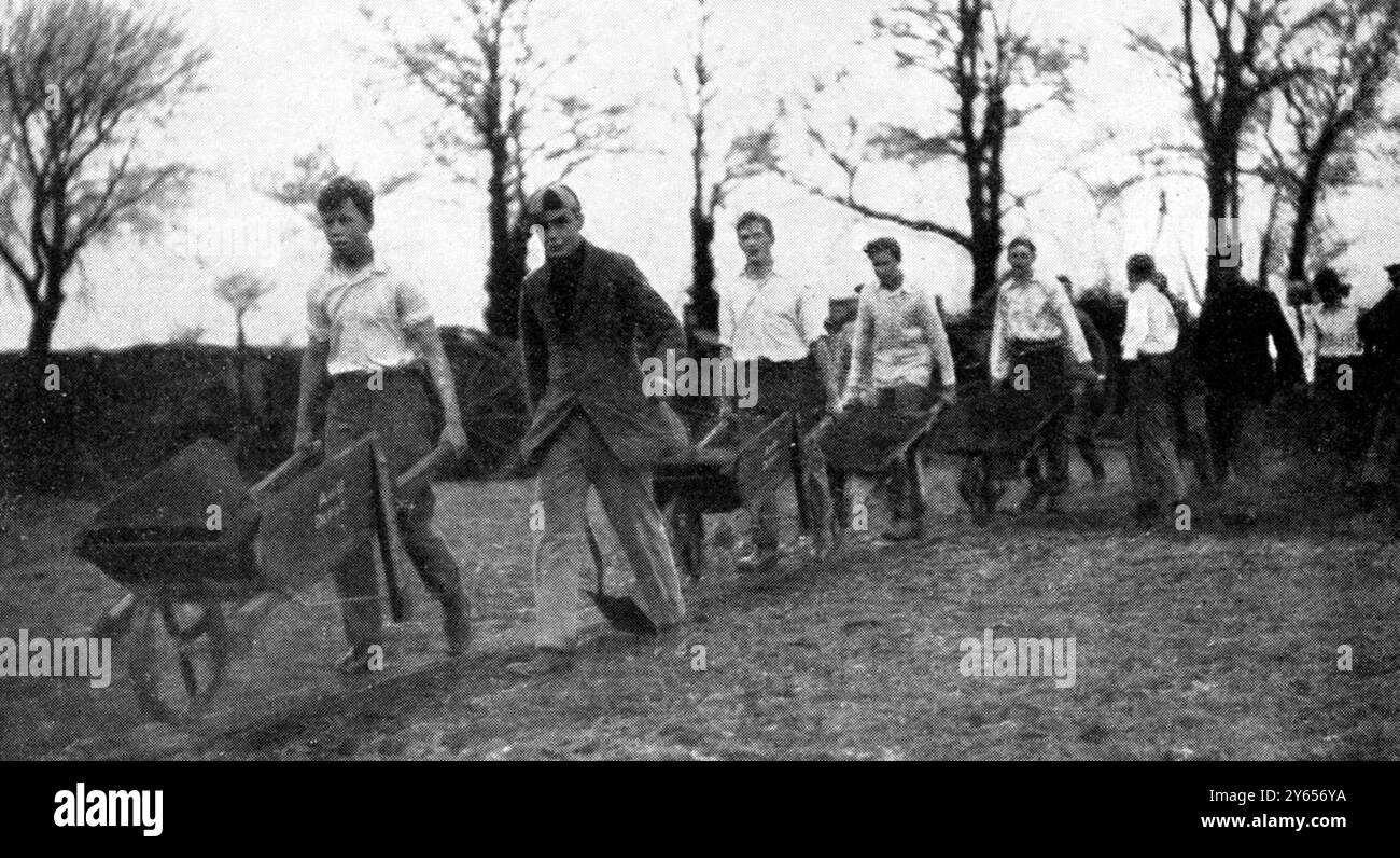 Founder's Day war work by Eton Boys : Shifting material in wheel ...