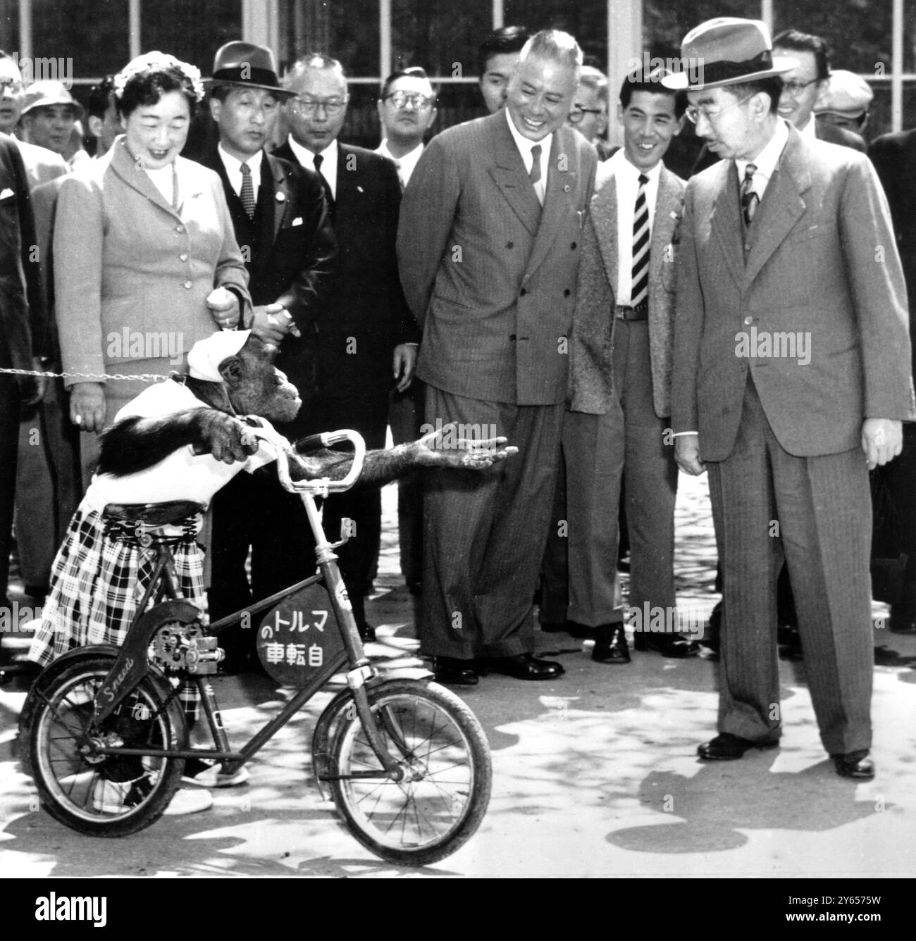 Emperor Hirohito of Japan , (right) is warmly greeted by Susie , a ...