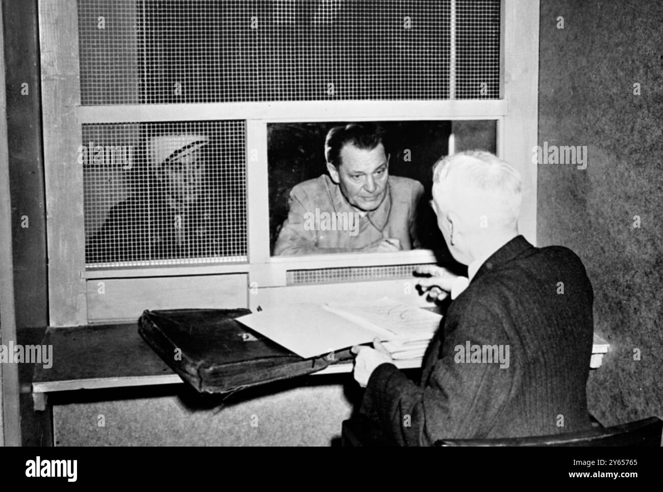Hermann Goering talking to his defense lawyer Dr. Otto Stahmer in the ...