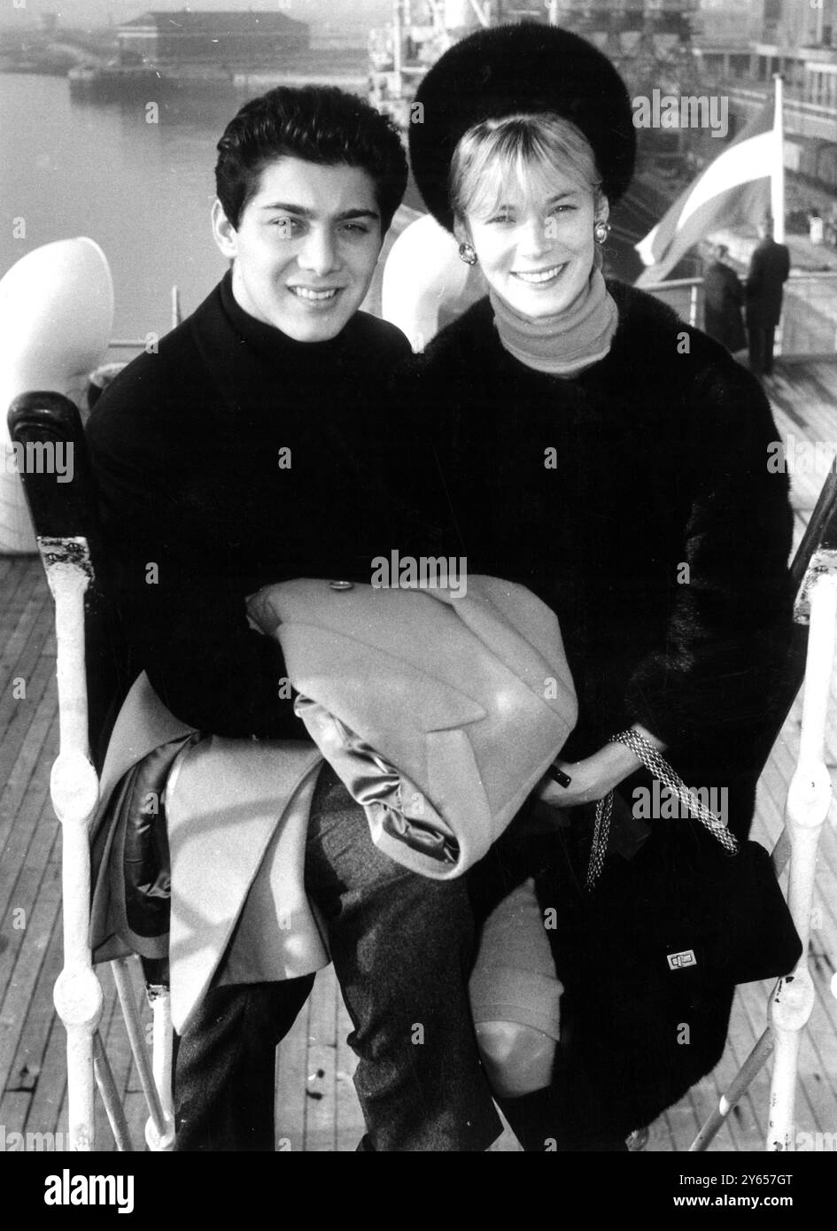 Southampton , Hants ; Well known singer , Paul Anka cuddles his wife ...