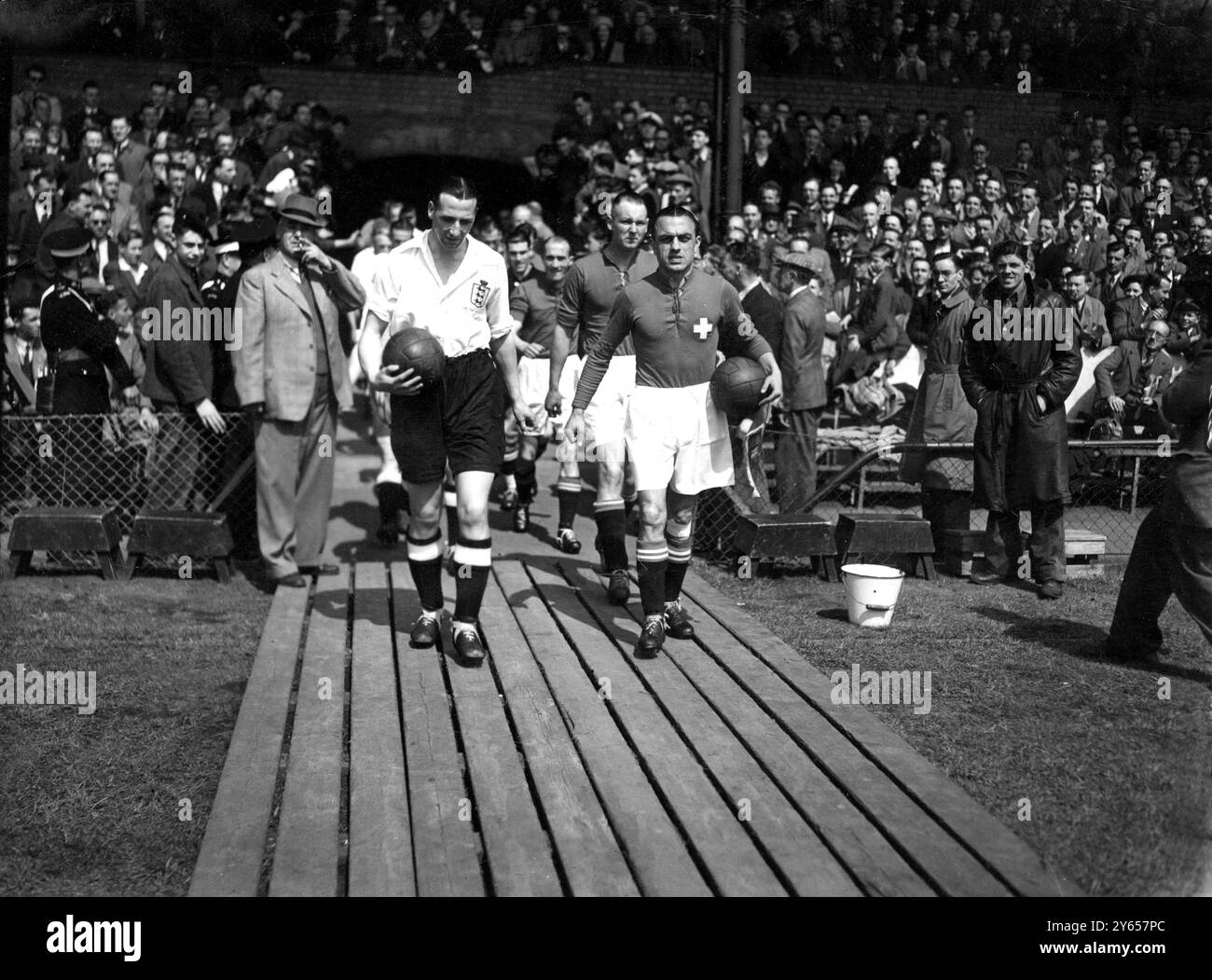 Soccer : Switzerland v England . An all - ticket crowd of 75 , 000 at ...