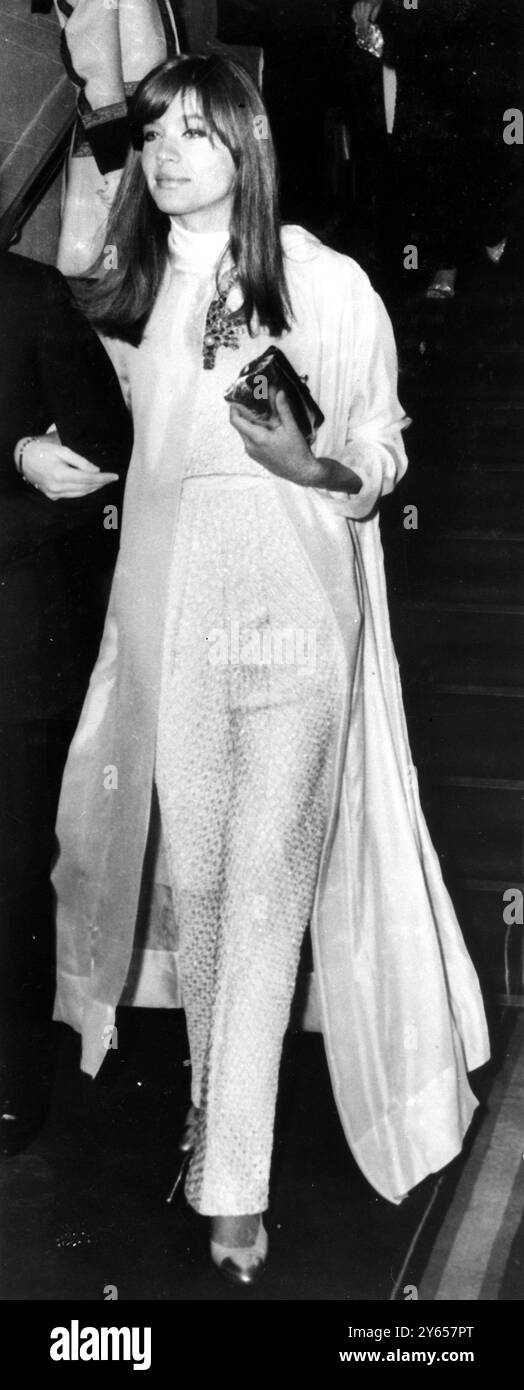 Paris ; Singer , Francoise Hardy wears this eye catching trouser suit ...