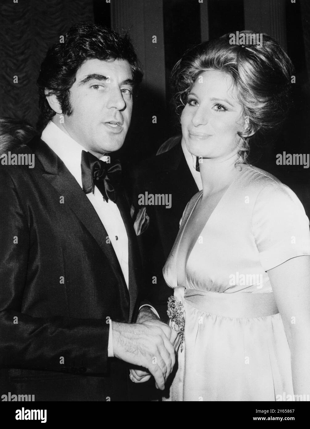Barbra Streisand chats with singer-actor-composer Anthony Newley after ...