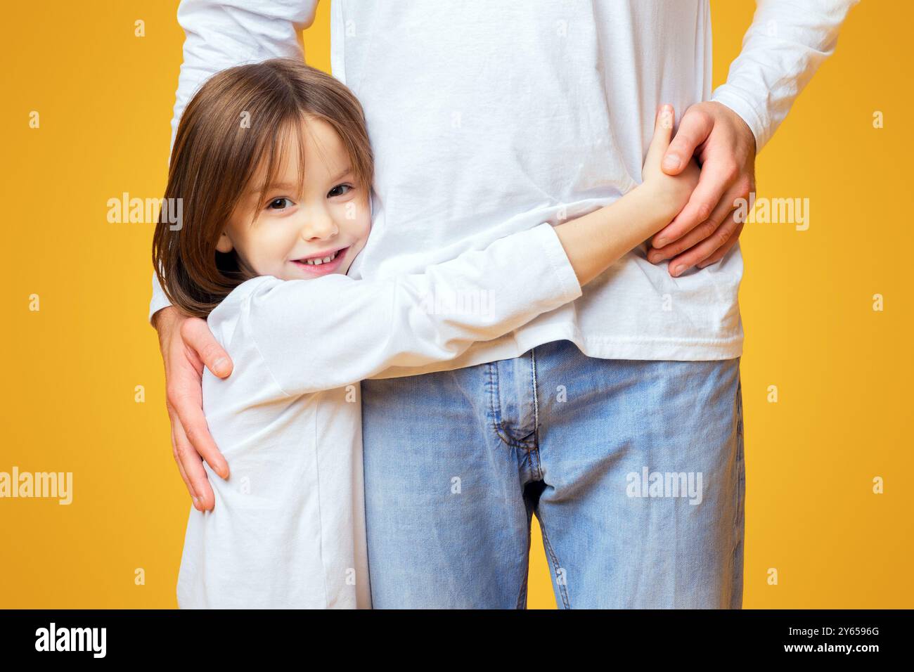 Cute smiling preschool girl hugging her daddy Stock Photo - Alamy