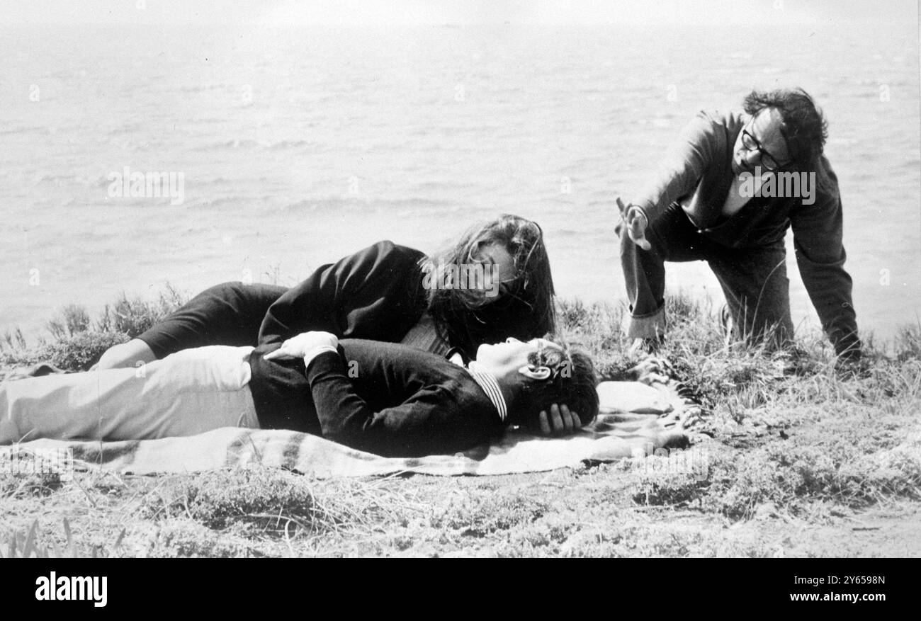 Screen stars Omar Sharif and Anouk Aimee are getting a few words of ...