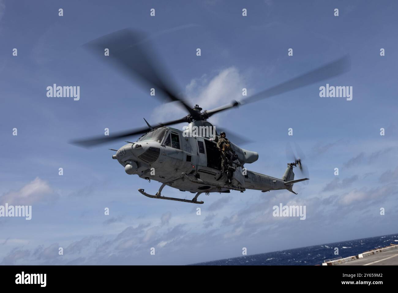 A U.S. Marine Corps UH-1Y Venom helicopter with Marine Medium Tiltrotor ...