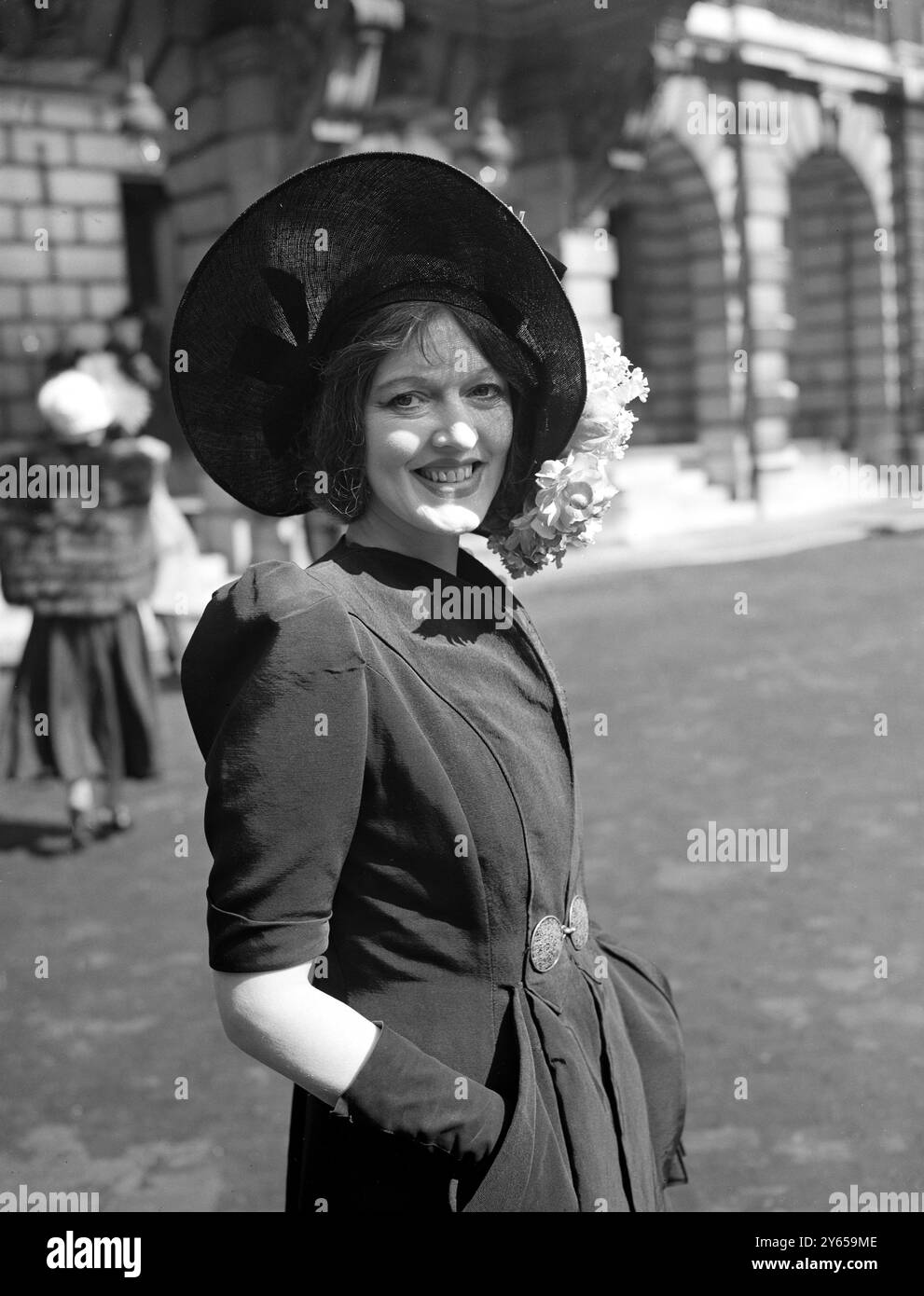 Lofty halo hat worn by Cowan Dobson as she arrives at Burlington House ...