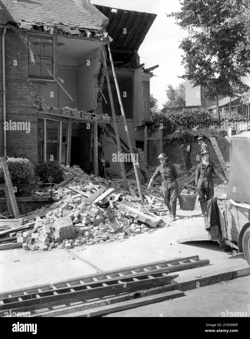 Home front 1940. Destroyed home in the Crayford area, after a German ...