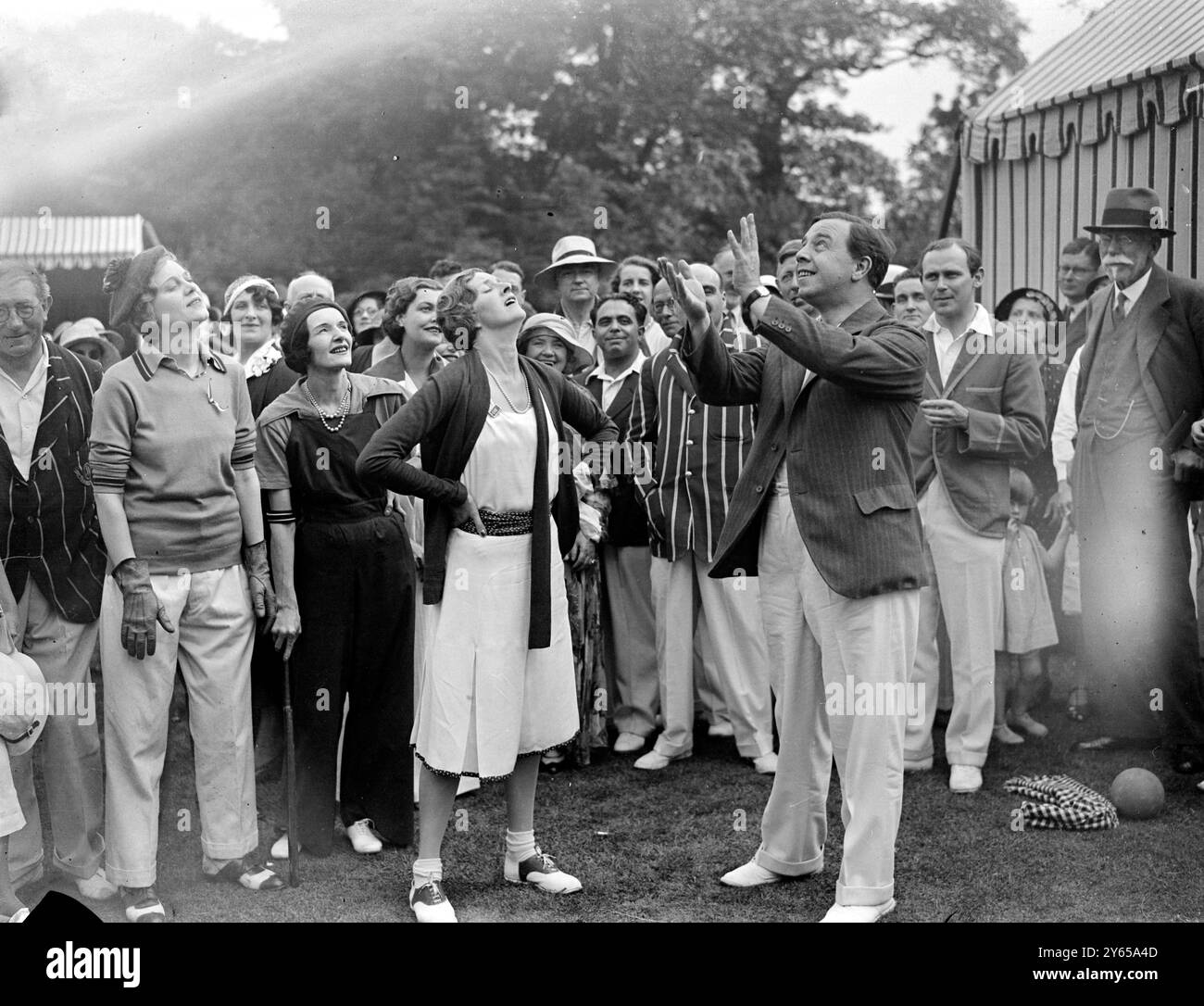 Tossing the cooper hi-res stock photography and images - Alamy