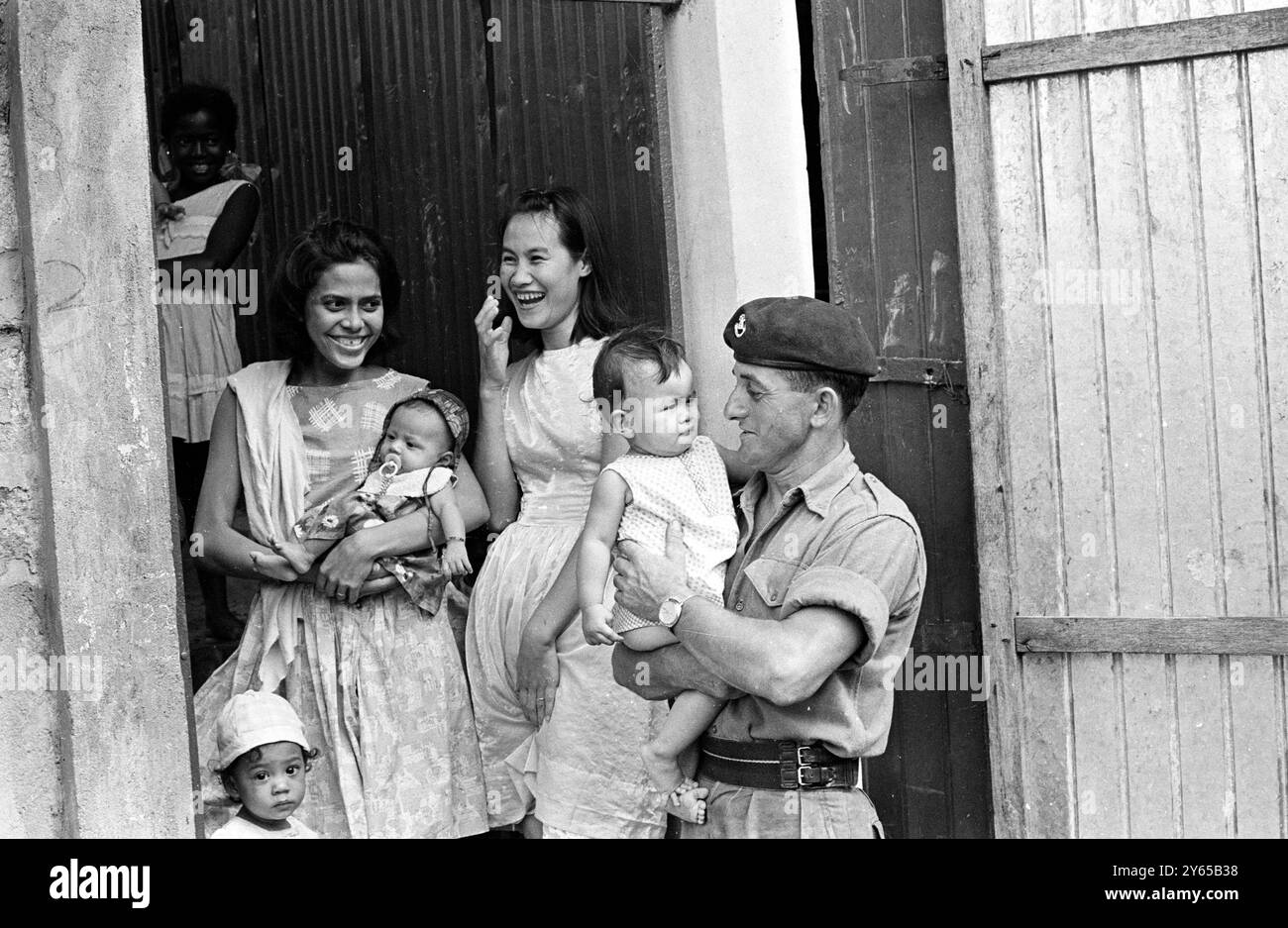 A British trooper , armed with an automatic weapon , on a lone mission ...