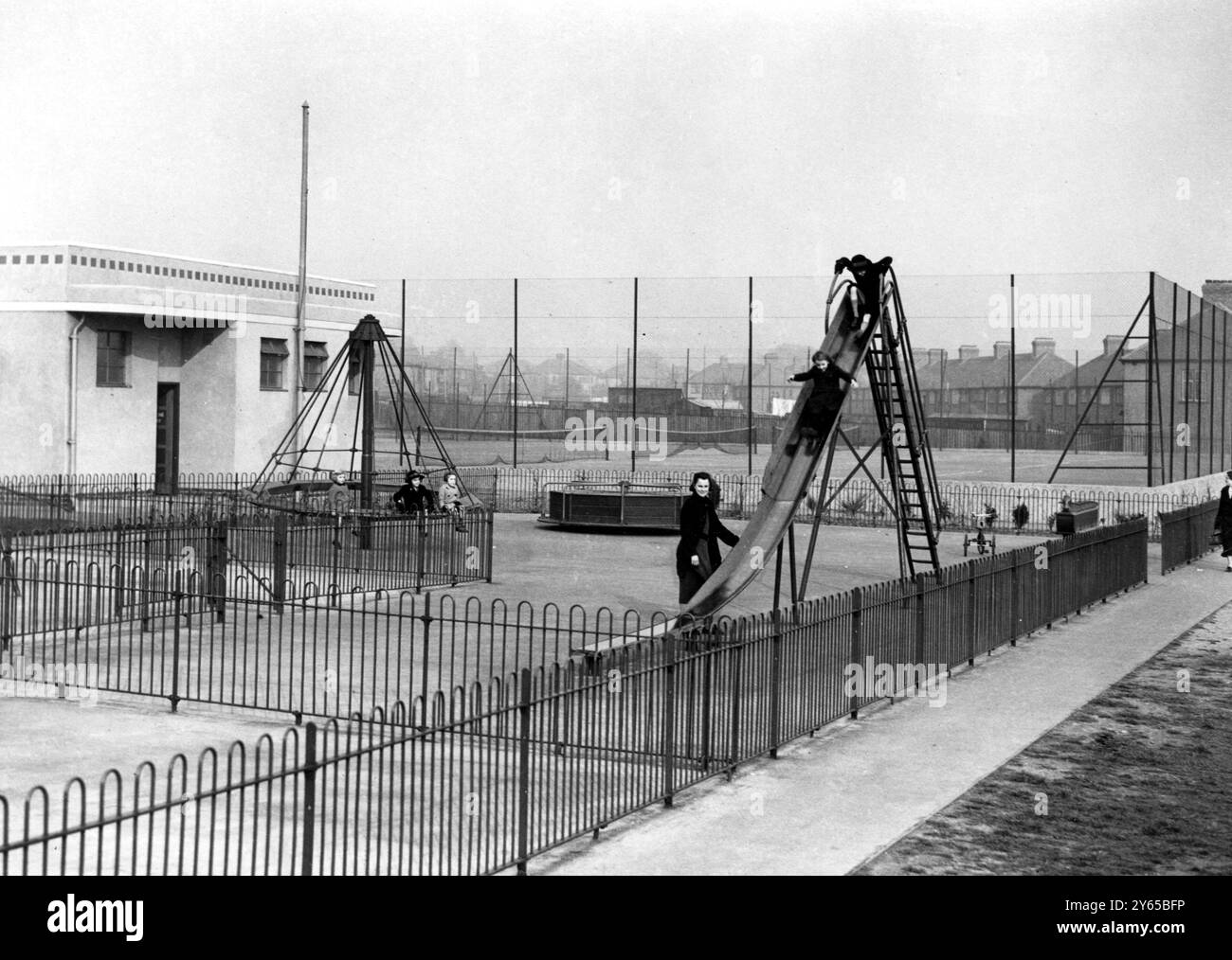 The children's playground : a mother takes her children to play on the ...