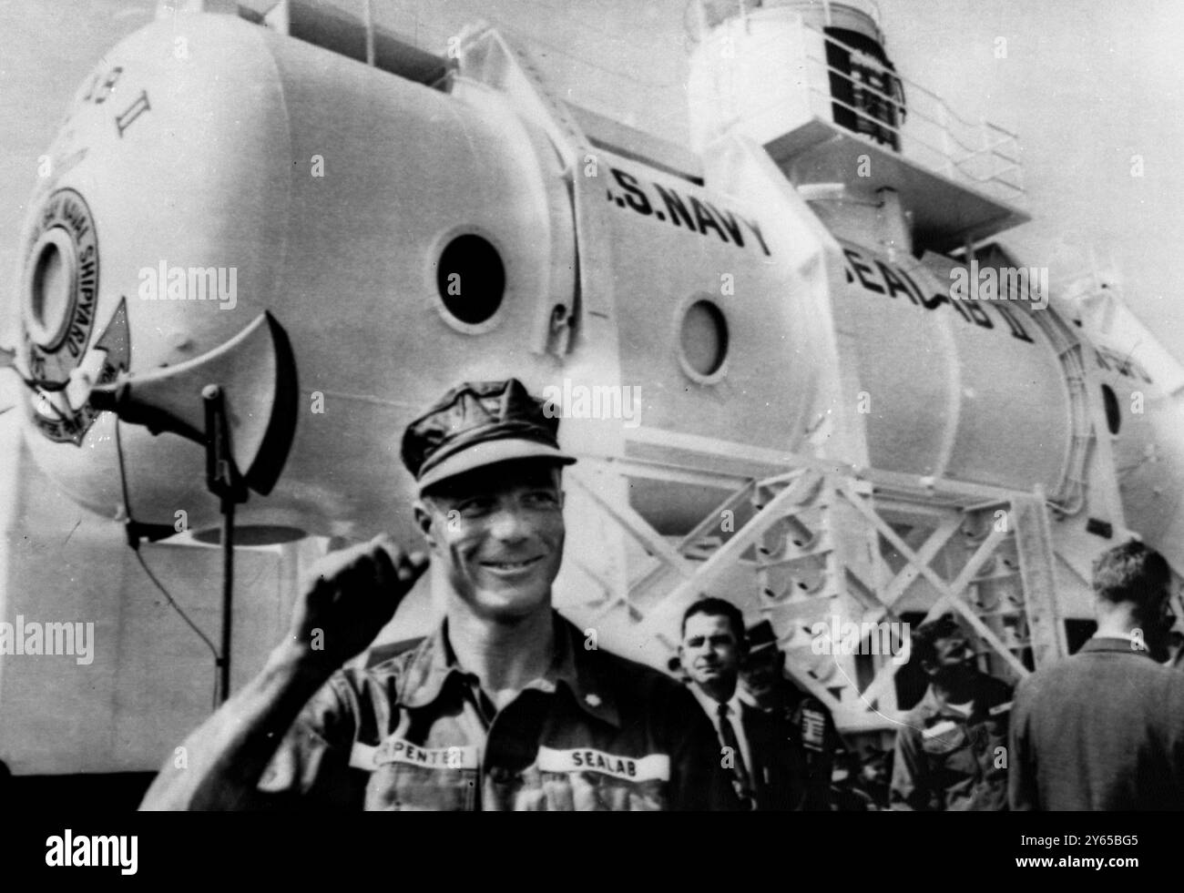 US Astronaut Scott Carpenter now working as an aquanaut poses in front ...
