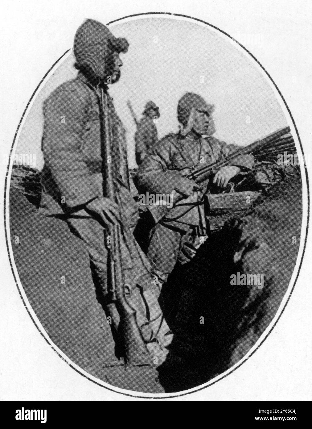 In the trenches before Chinchow , the town which the Japanese occupied ...