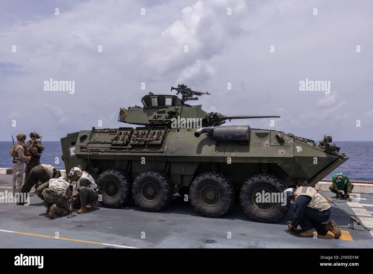 U.S. Marines with the combat cargo section, amphibious transport dock ...