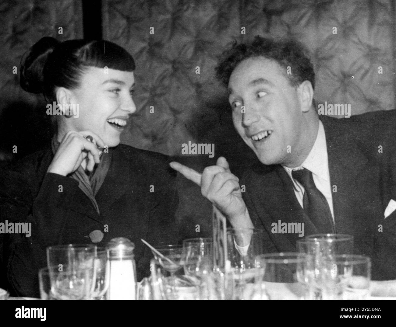 Frankie Howerd telling a yarn to Helen Gallagher at the Cafe de Paris ...
