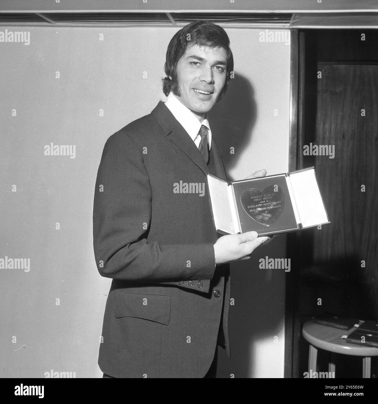 Singer Engelbert Humperdinck pictured with the inscribed silver heart ...