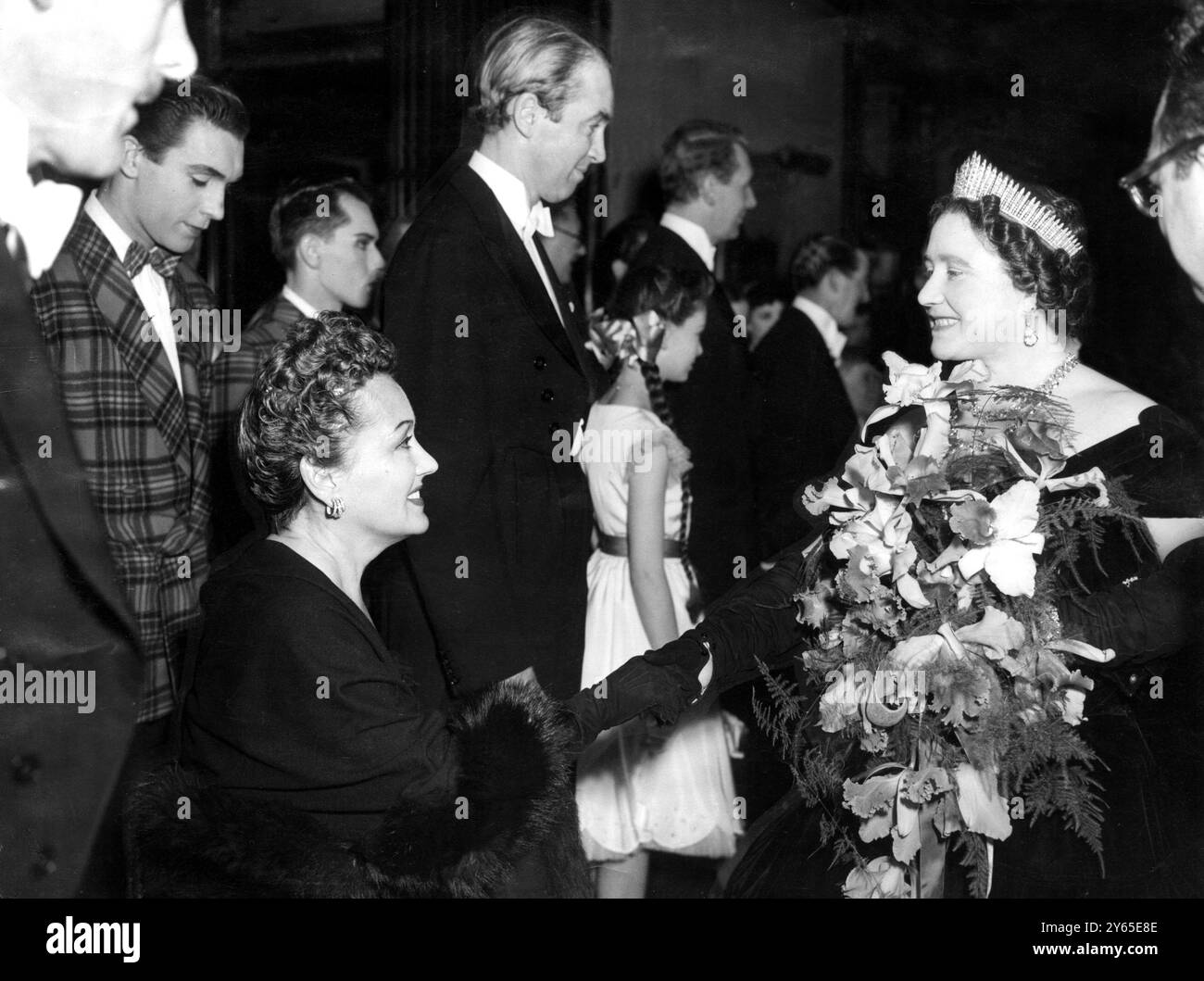 Queen Elizabeth, The Queen Mother shakes hands with American film ...