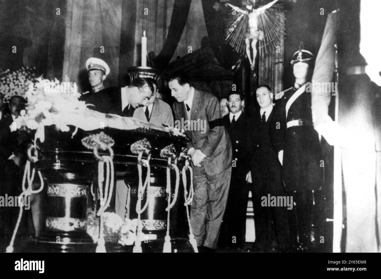 Death of Eva Peron President Juan Peron (wearing black armband) and ...