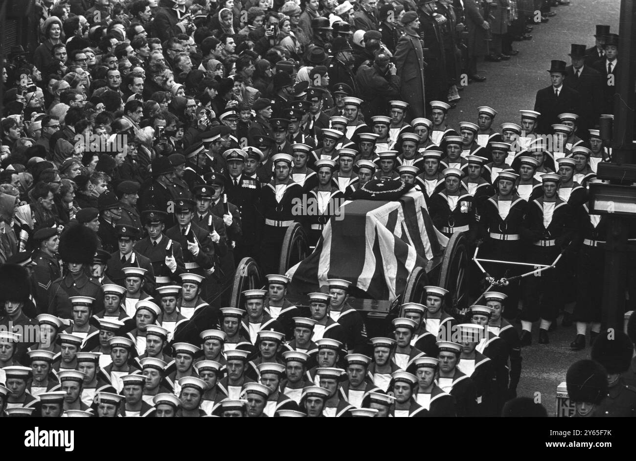 Churchill Coffin Drawn Through Streets The flag draped coffin of Sir ...