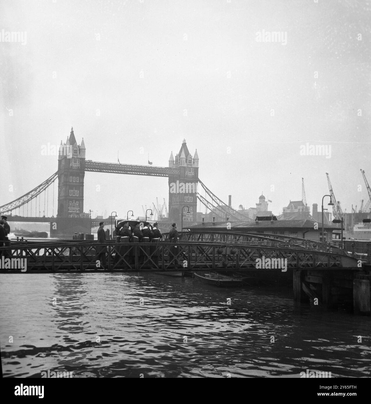 Dawn Rehearsal With Tower Bridge in the background , eight white gloved ...