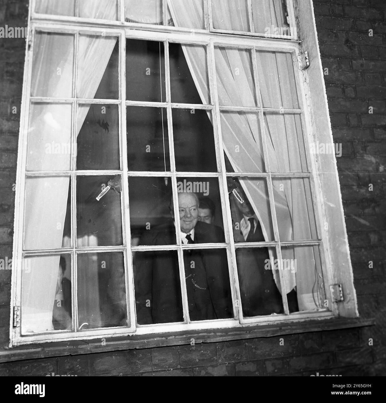Winnie At The Window Sir Winston Churchill , 88 years old , peers from ...