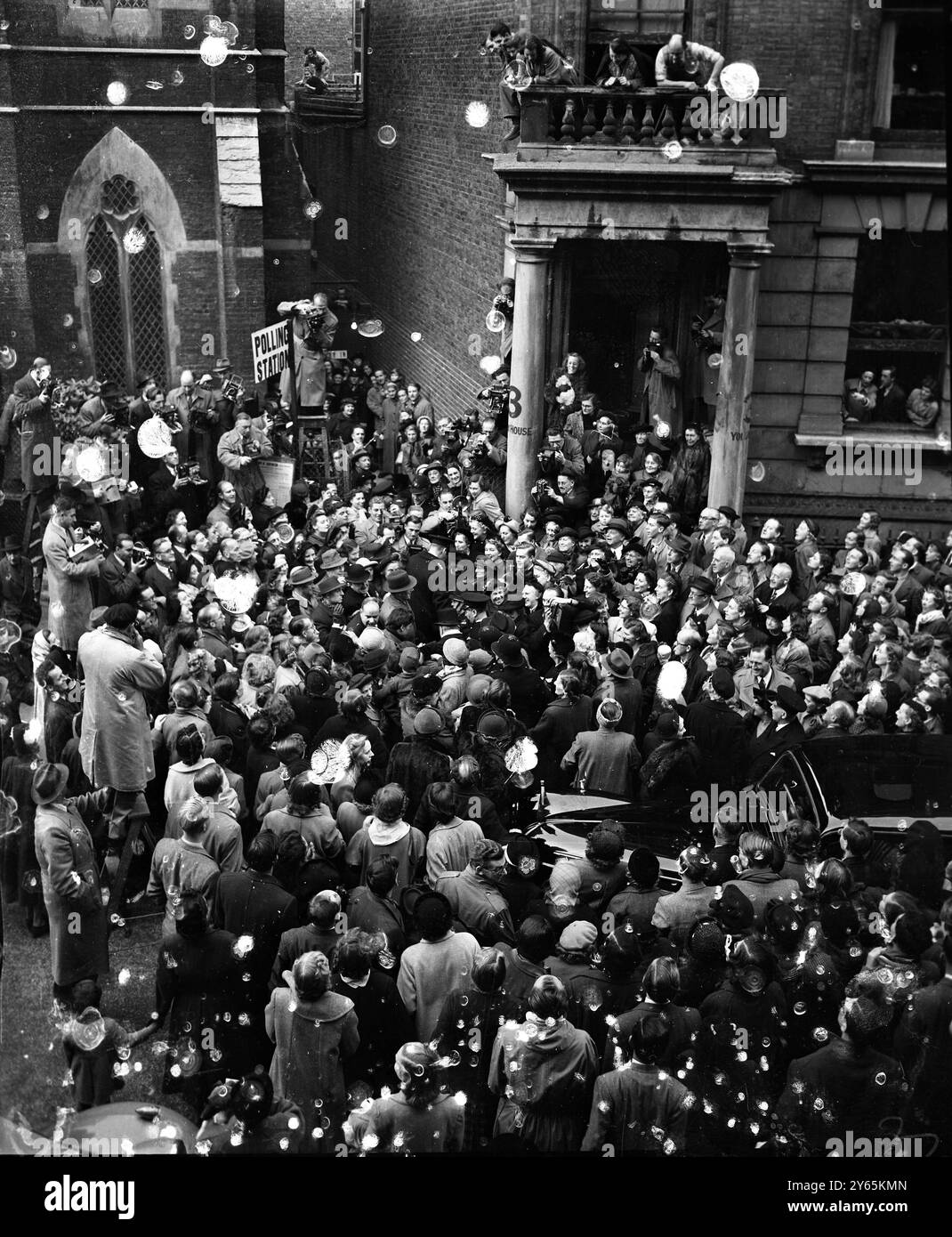 Churchill Vote - Huge Crowd at Polling Station . A huge cheering crowd ...