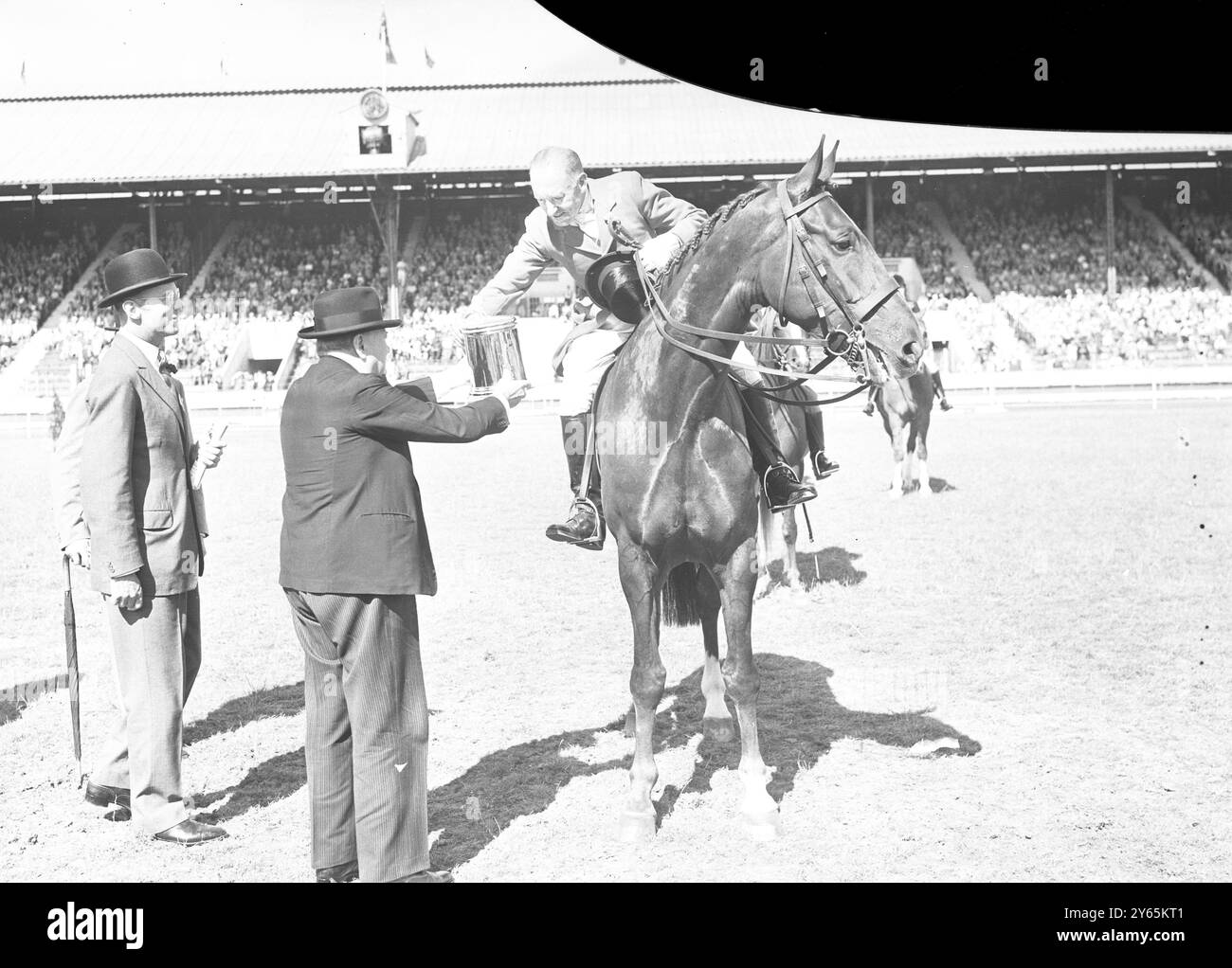 Receives Challenge Cup from Churchill . Mr Winston Churchill presenting ...