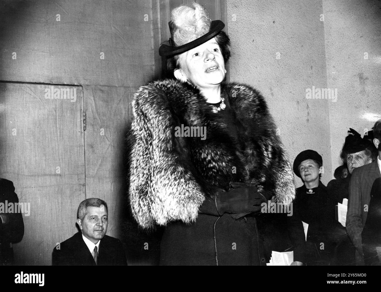 Miss Ellen Wilkinson , Minister for education , wearing a striking hat ...