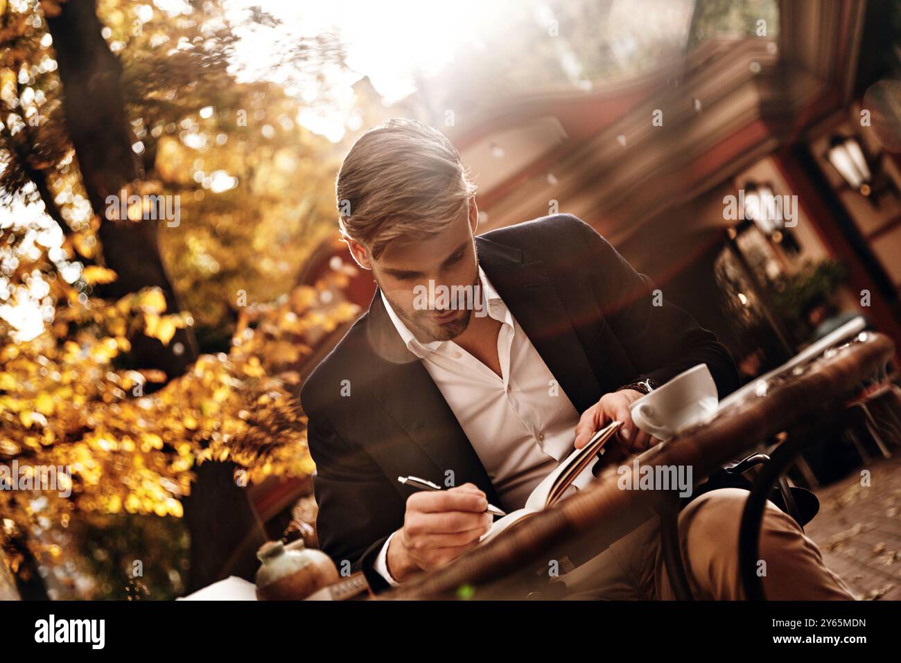 Everything must be planned. Good looking young man in smart casual wear ...