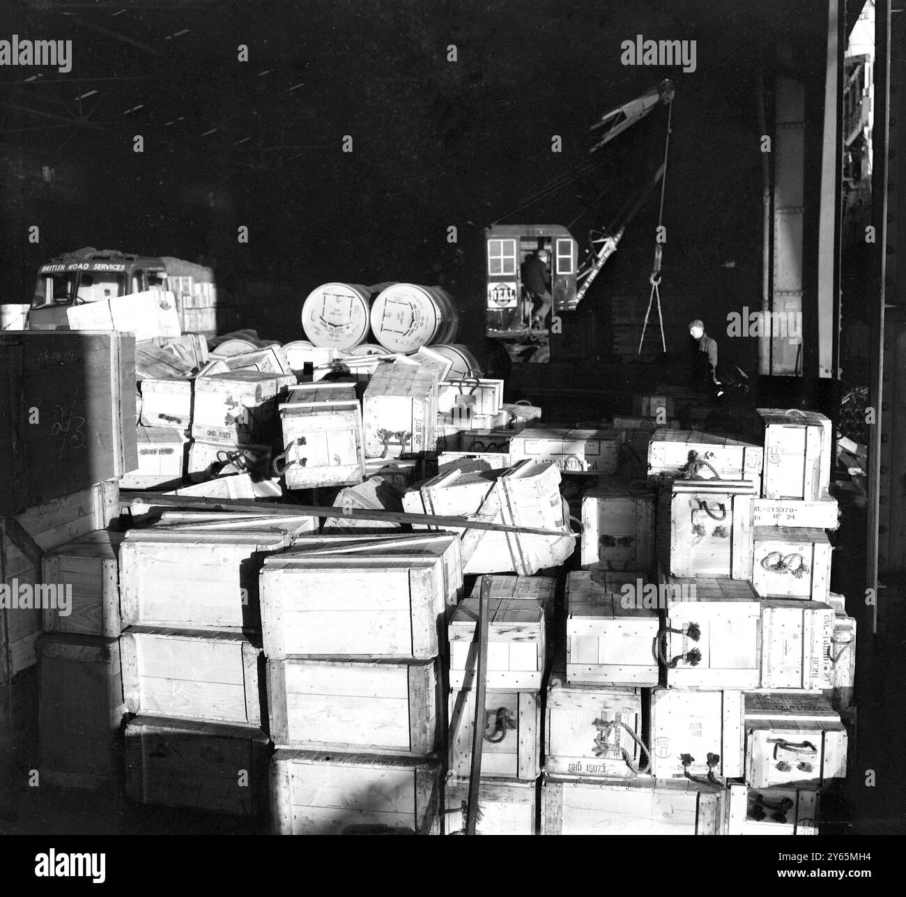 Cases of war material stacked on the Alexandra Dock at Liverpool for ...