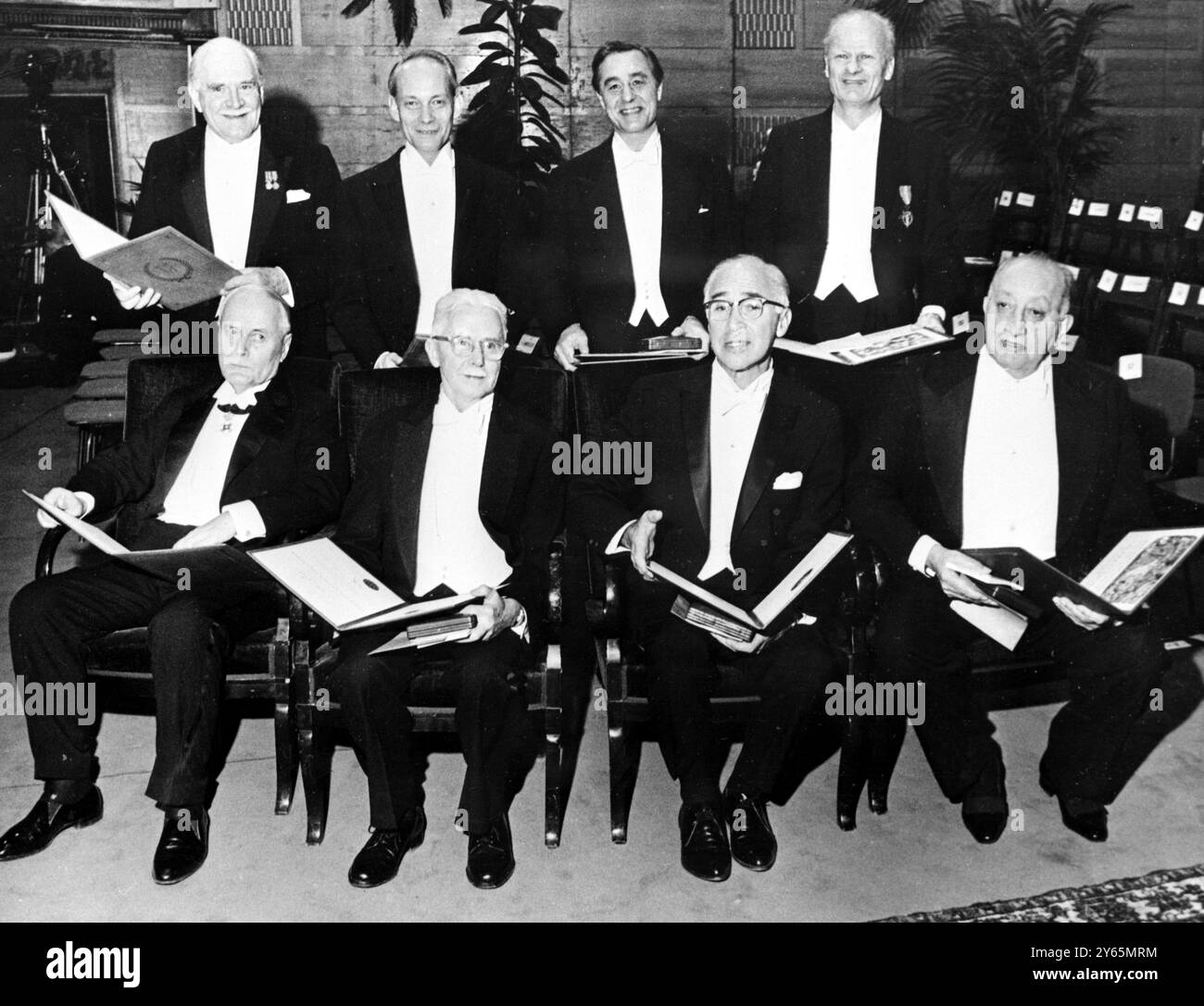 The eight Nobel Prize winners with their diplomas , LtoR back row ...