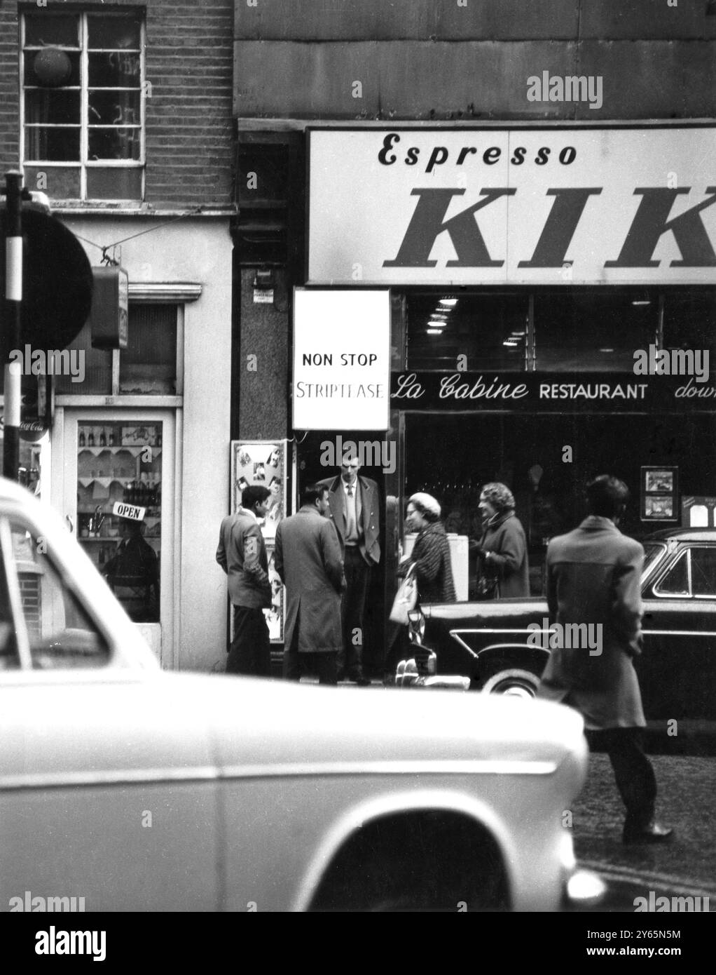 Scenes in Soho in the 1960s Viwe of the entrance to a London striptease ...
