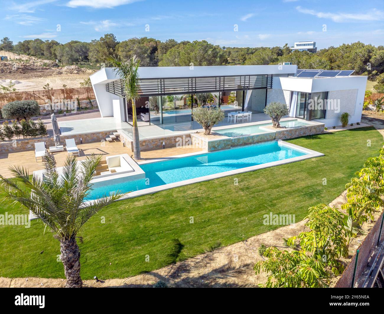 An aerial view of a luxurious contemporary Mediterranean villa ...