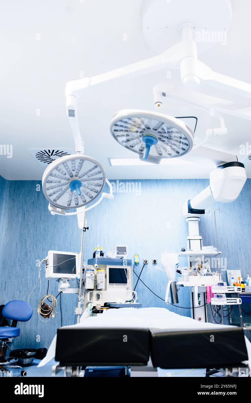 Interior view of a state-of-the-art hospital surgery room with overhead ...
