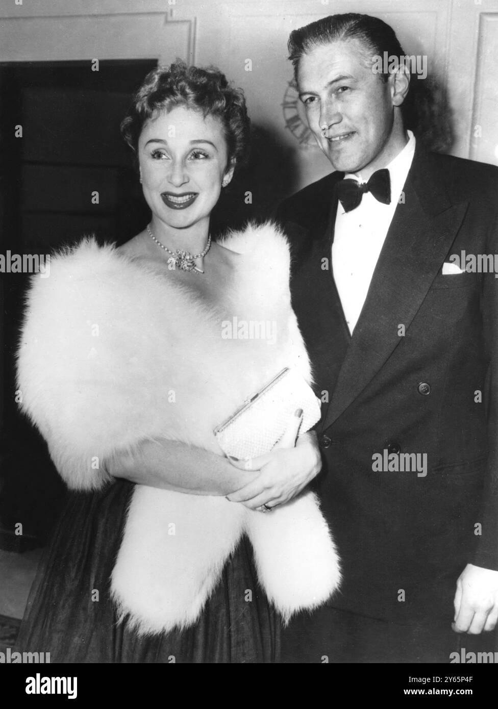 Actress Googie Withers and her husband , actor John McCallum , arrive ...