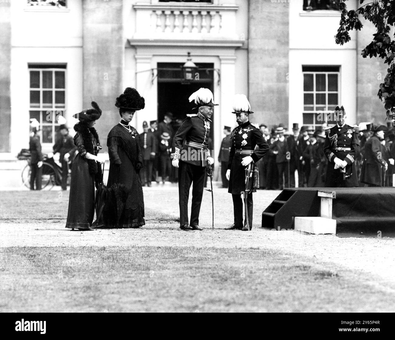 King George V and Queen Mary pictured during a visit to Chelsea ...