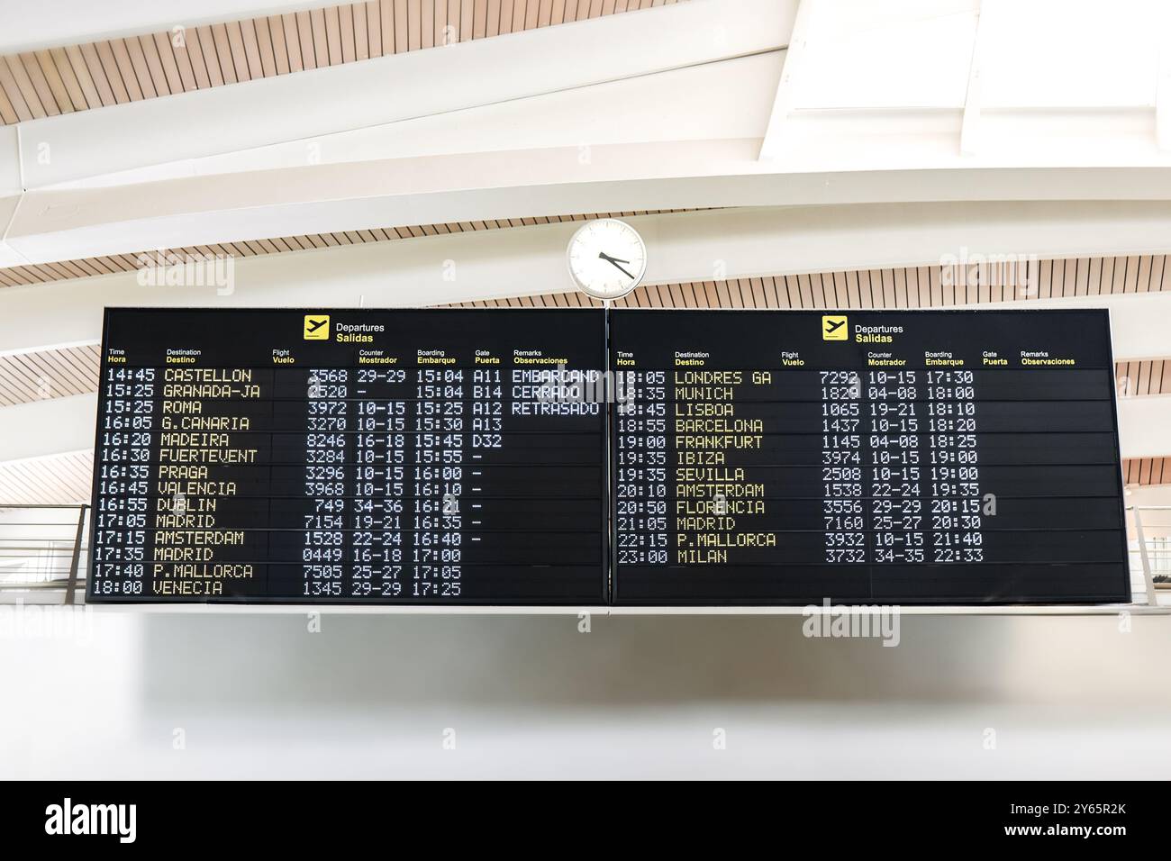 Airport departure boards showing times and destinations for flights ...