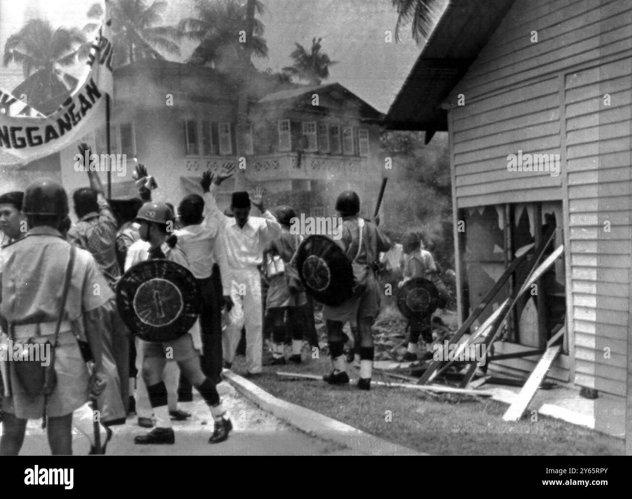 Shield protected Police move back a crowd of Protesters who have ...