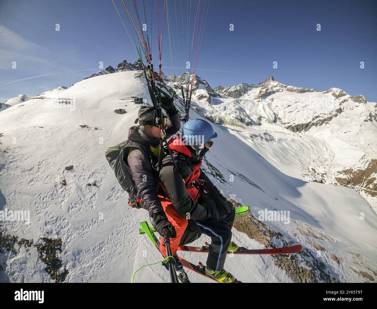 A breathtaking moment captured when two people paraglide in tandem over ...