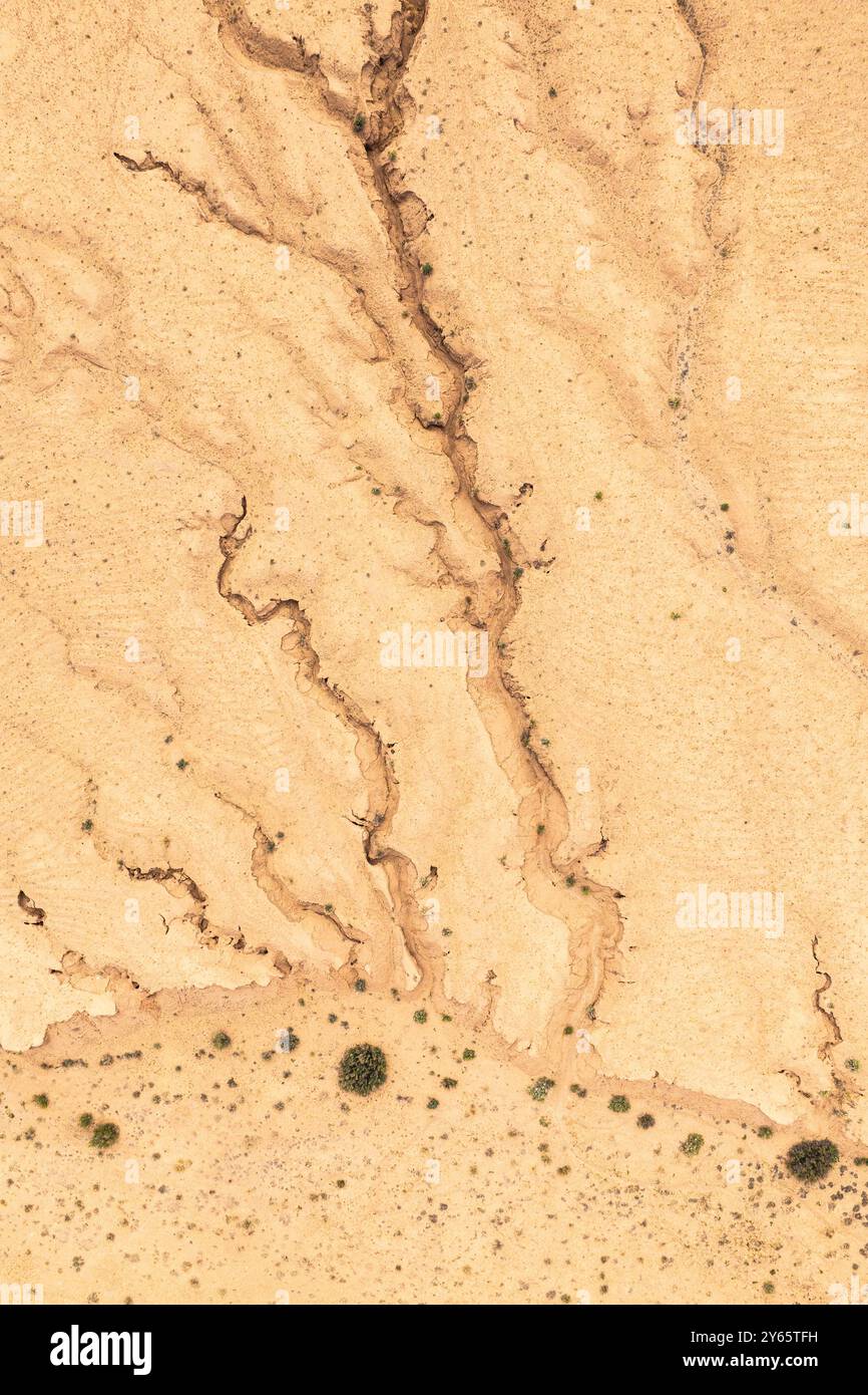 Aerial view of natural eroded patterns in the sandy landscape of Goblin ...