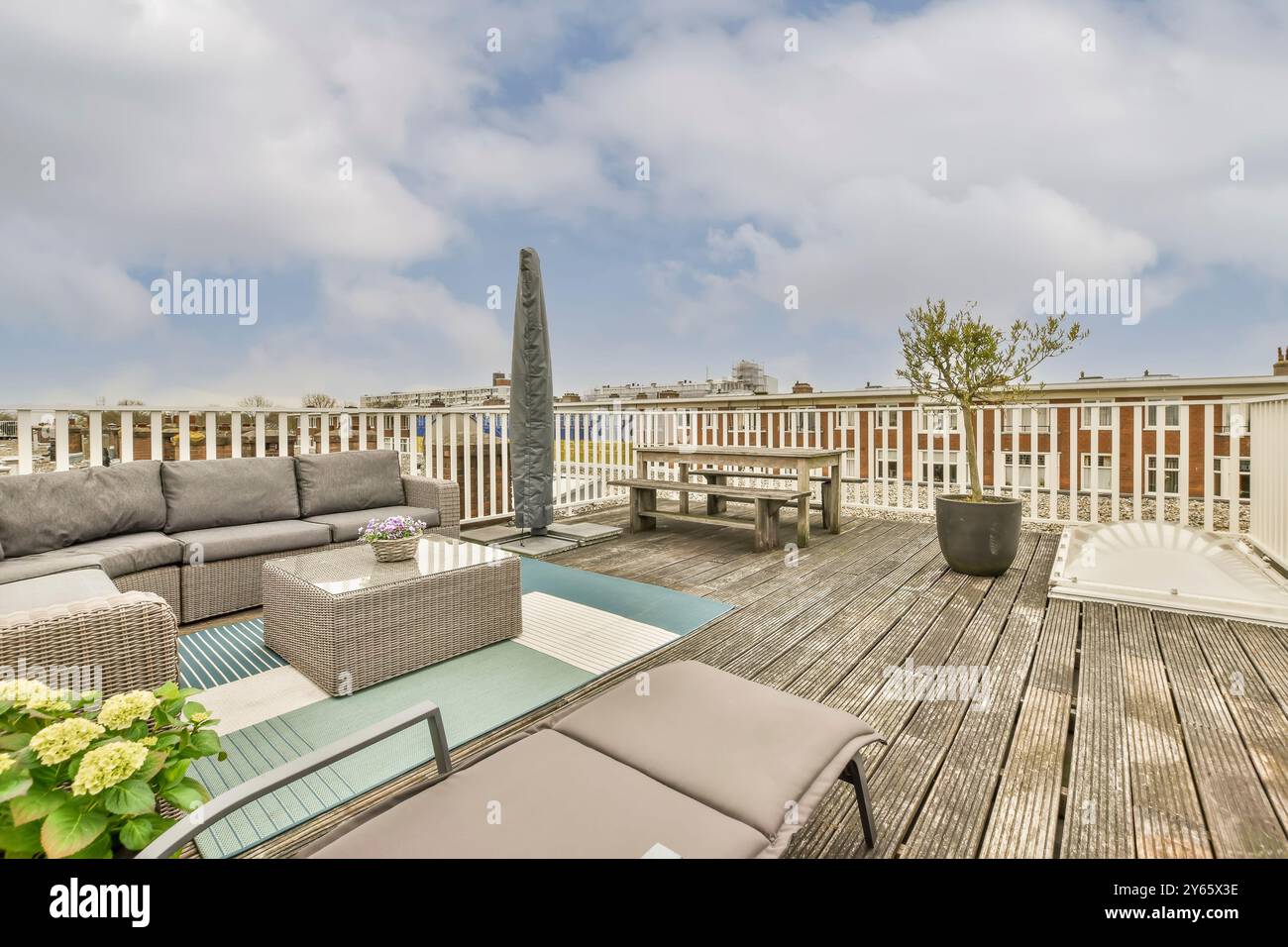 Elegant rooftop terrace featuring modern outdoor furniture, a cozy ...