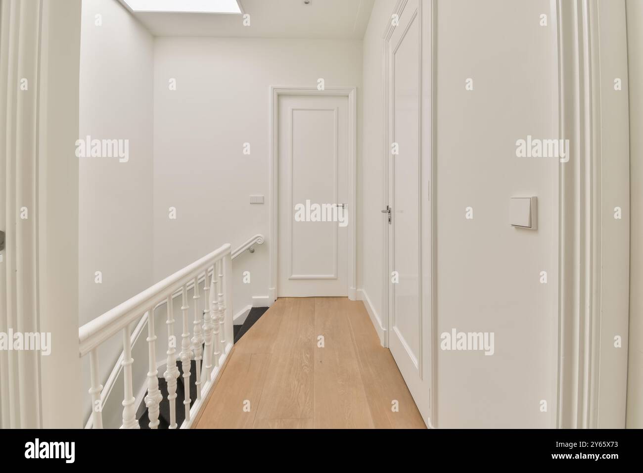 This image showcases a modern, well-lit home interior featuring an ...