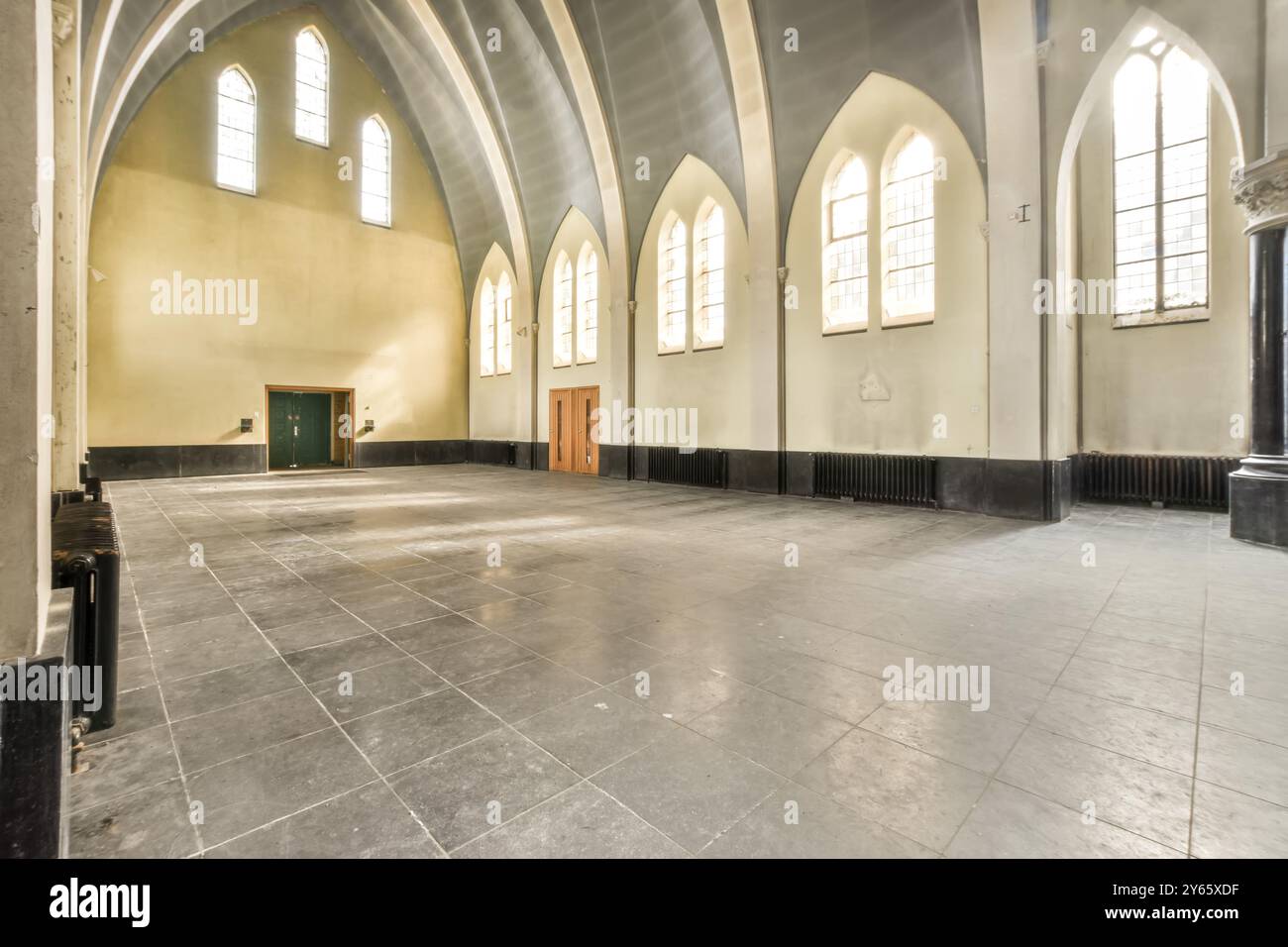 Expansive interior view of an old church building, showcasing tall ...